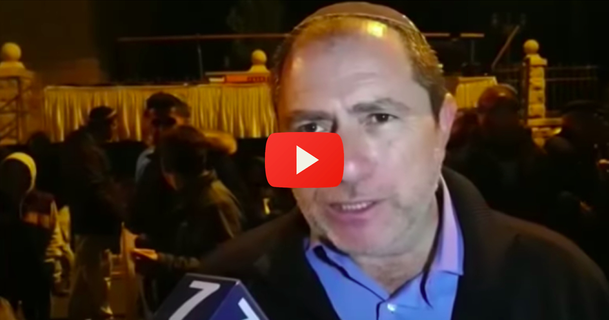 Terror victim's father attends protest to share hope and strength